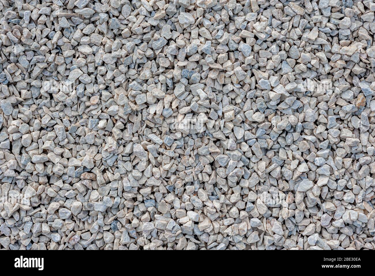Natural stone pebble material texture background Stock Photo - Alamy