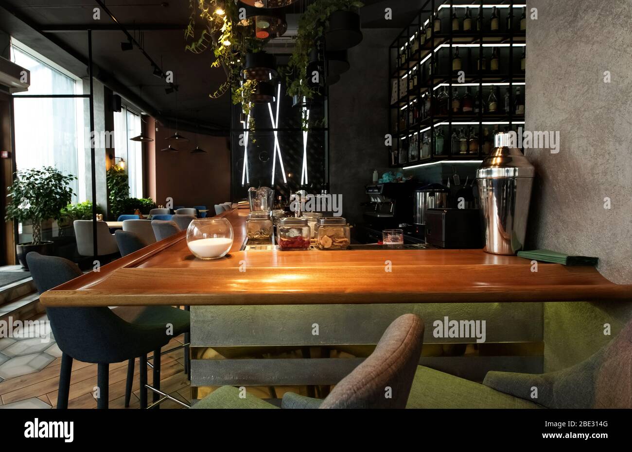 Interior of a modern urban restaurant with half-lighted bar Stock Photo ...