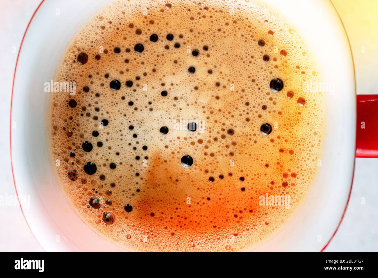 Close-up of caramel forms latte art in coffee. Liquid texture of the ...