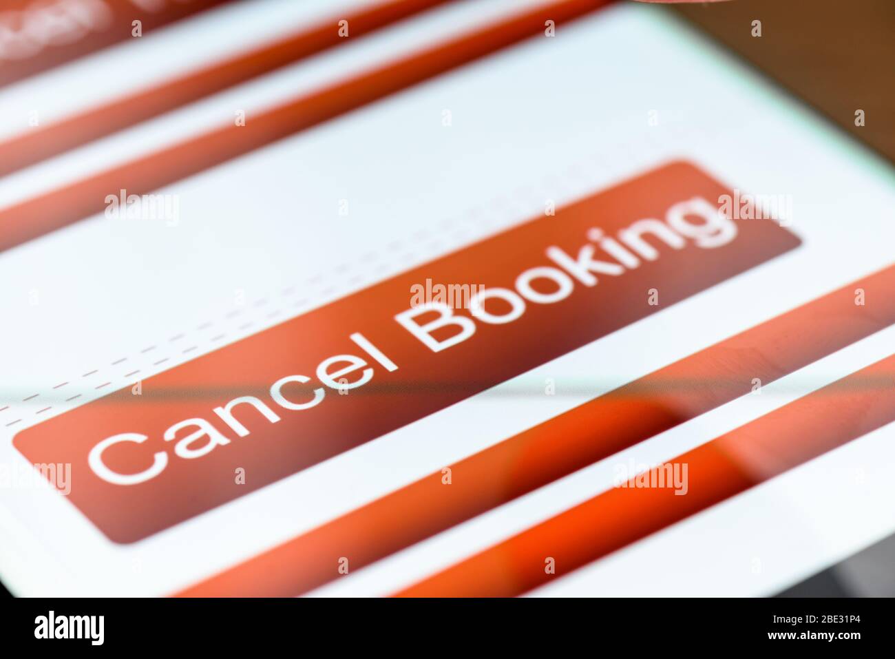 cancel booking text button on smart phone screen Stock Photo - Alamy