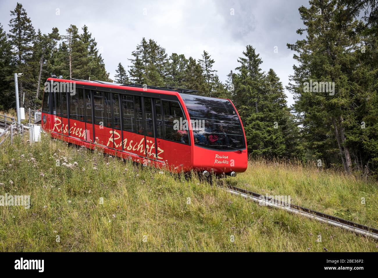 The Resciesa funicular railway descending the mountain towards Ortisei ...