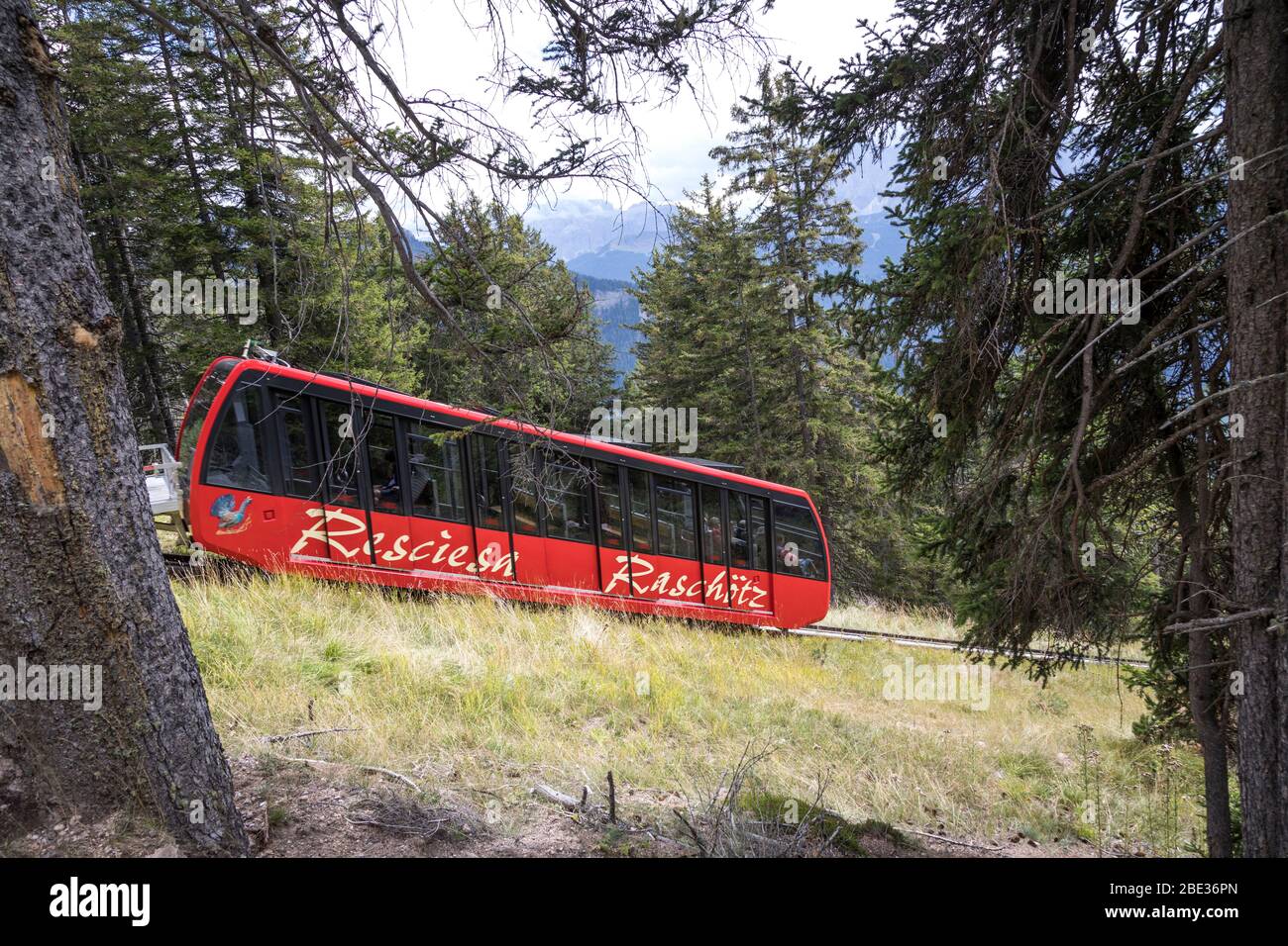 The Resciesa funicular railway descending the mountain towards Ortisei ...