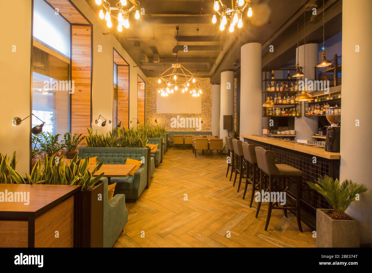 Contemporary design in loft style, modern dining place Stock Photo - Alamy