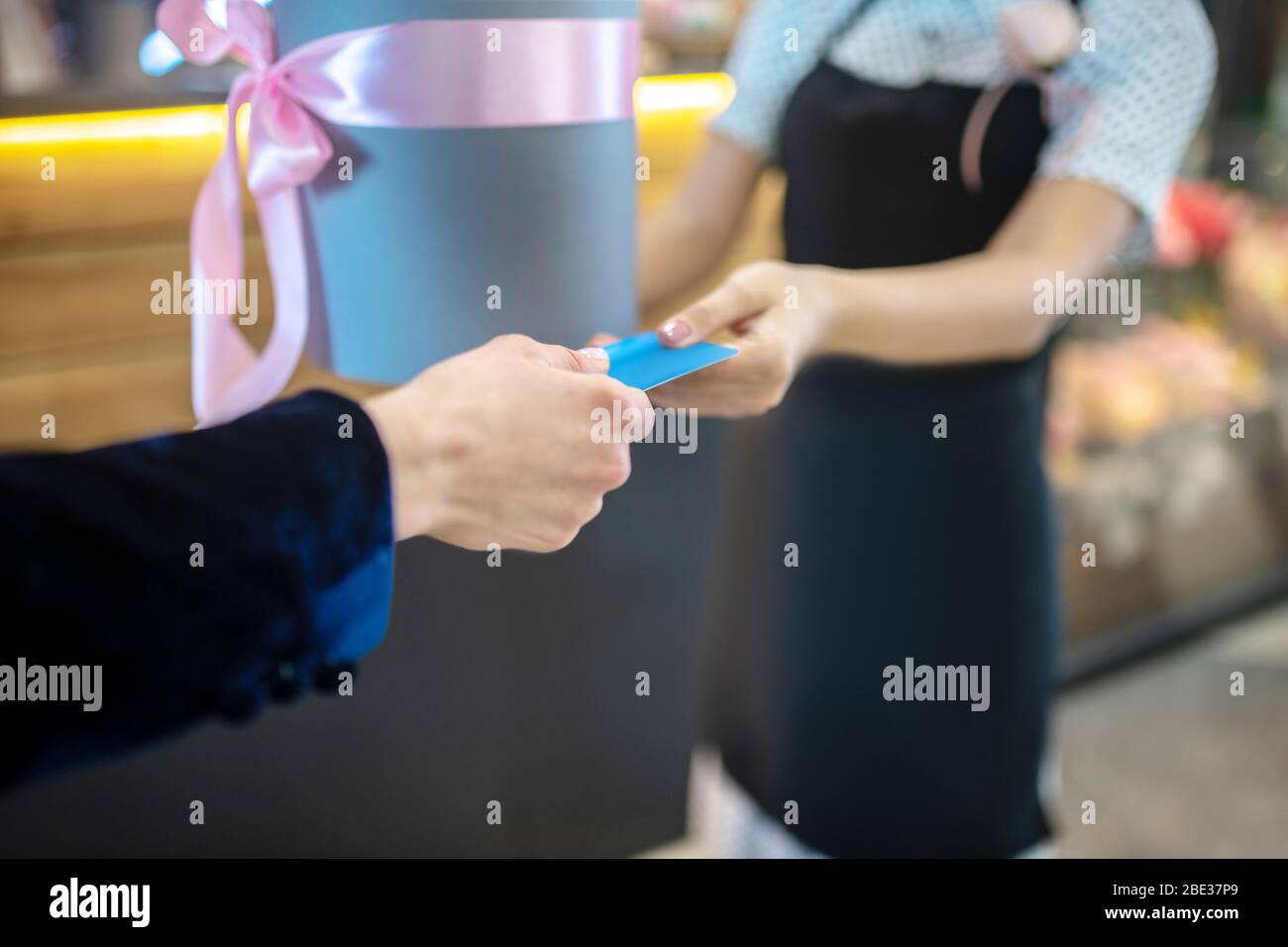 Woman holding mans arm hi-res stock photography and images - Alamy