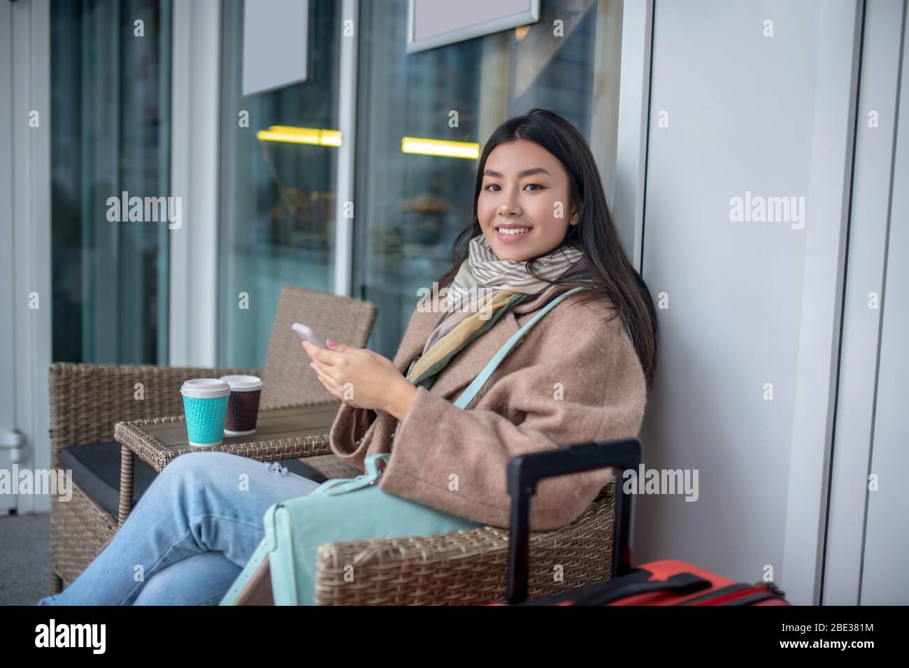 Pretty asian young woman feeling good and positive Stock Photo - Alamy