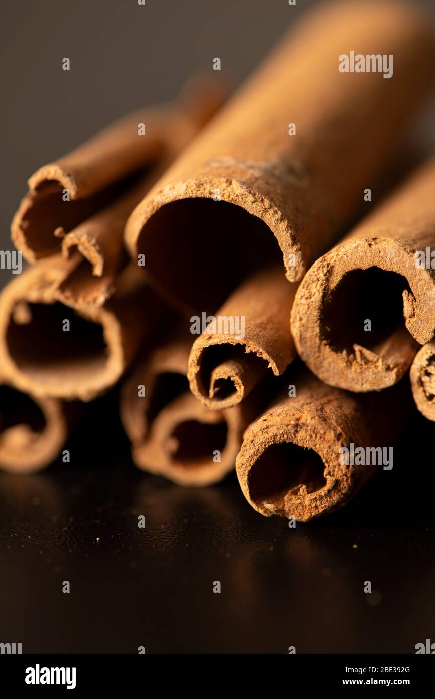Cinnamon sticks close up photo Stock Photo - Alamy