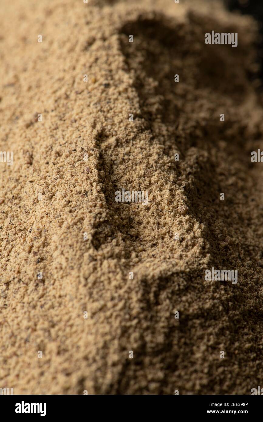 Ground White Pepper texture, full frame background in a mountain shape ...