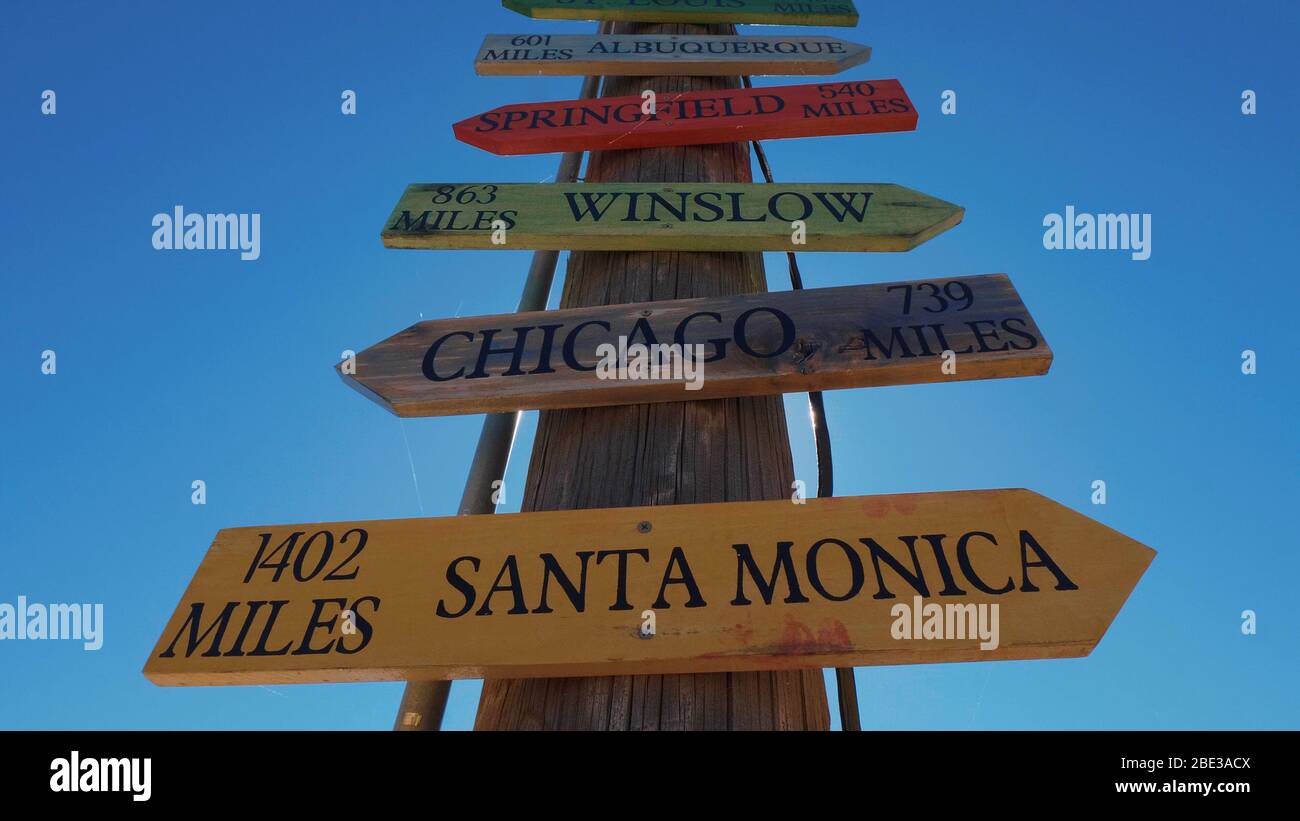 Direction signs to famous cities at Route 66 Stock Photo - Alamy