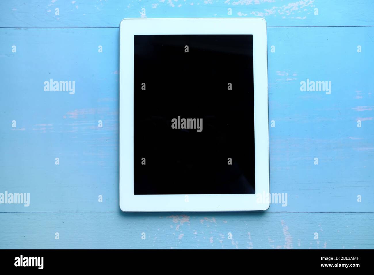 top view of digital tablet with blank screen on blue Stock Photo - Alamy