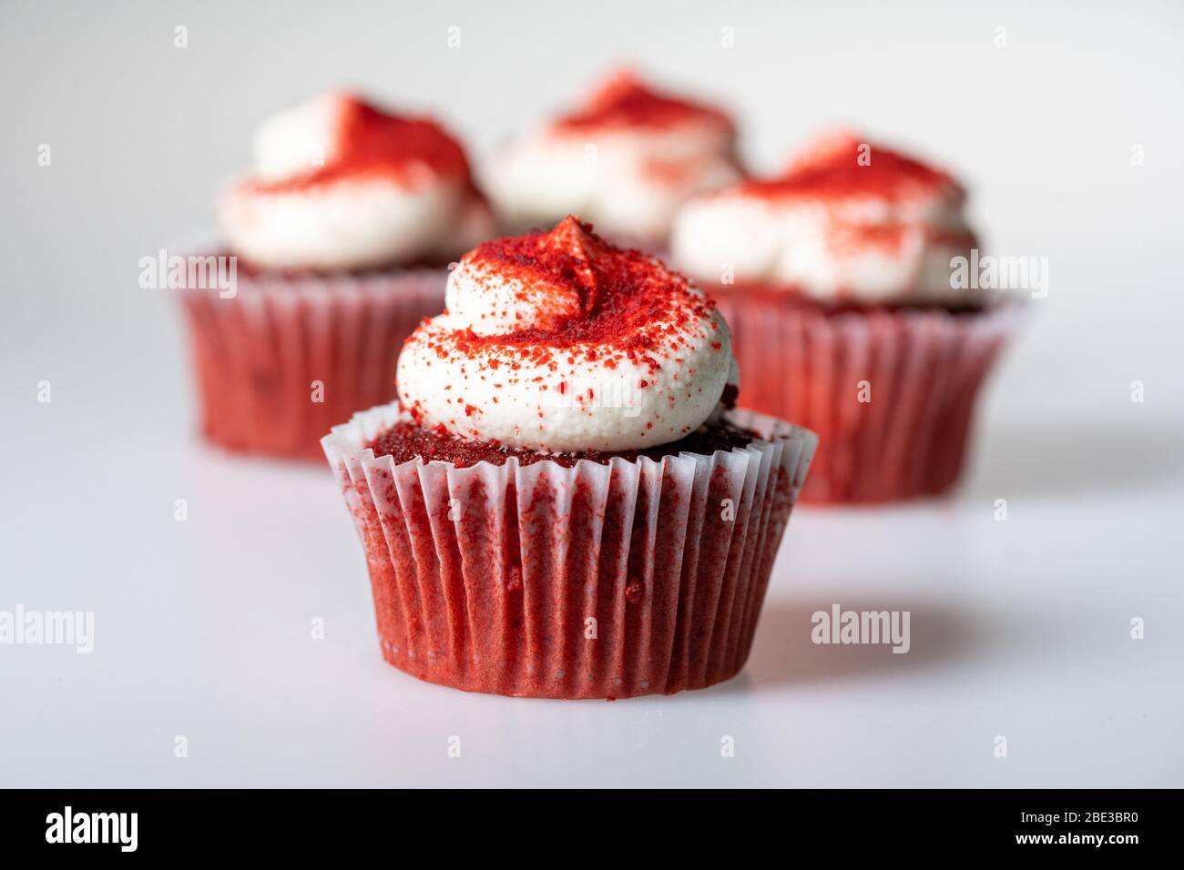 Group of Red Velvet Cupcakes on White Background Horizontal Stock Photo ...