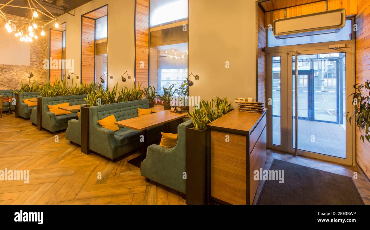 Restaurant interior with cozy atmosphere, stylish dining places Stock ...