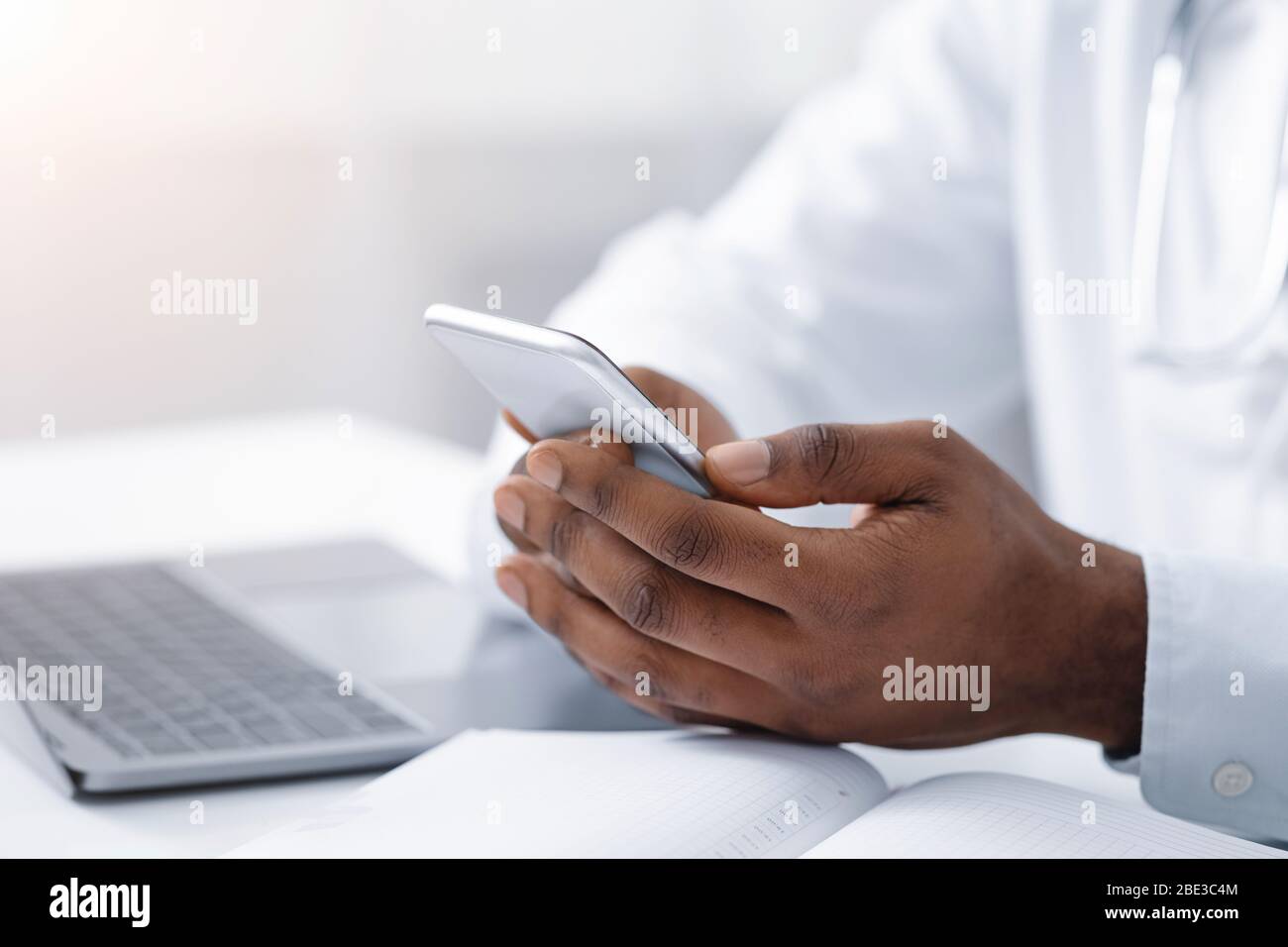 Close up of doc hands using mobile phone Stock Photo - Alamy