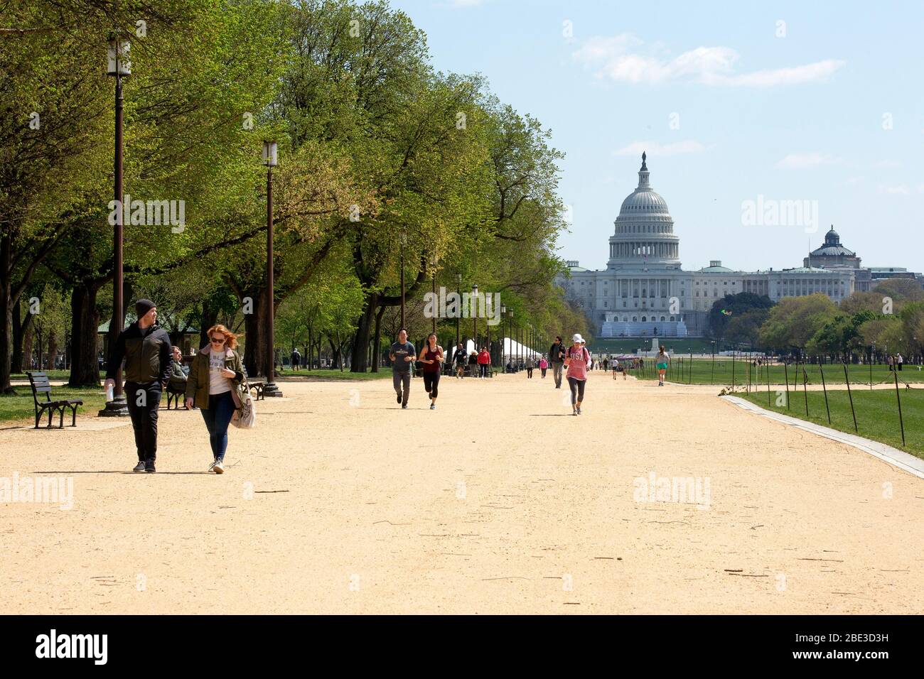 Washington, DC, USA. 11th Apr, 2020. Pedestrians walk the National Mall ...