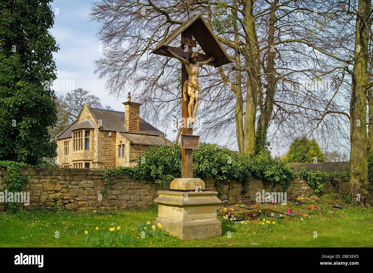 UK, South Yorkshire, Hickleton, Crucifix in St Wilfrids Church Yard ...