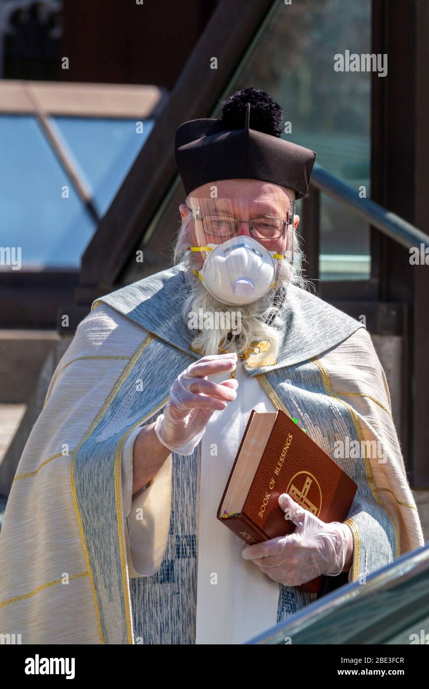 Grosse Pointe Park, Michigan, USA. 11th Apr, 2020. Wearing a mask, face ...