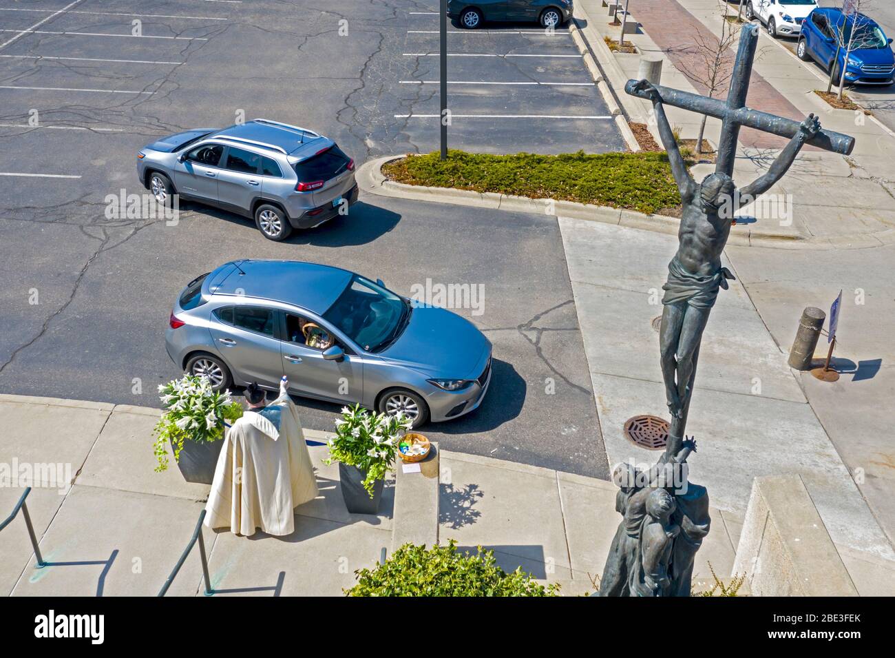 Grosse Pointe Park, Michigan, USA. 11th Apr, 2020. Wearing a mask, face ...