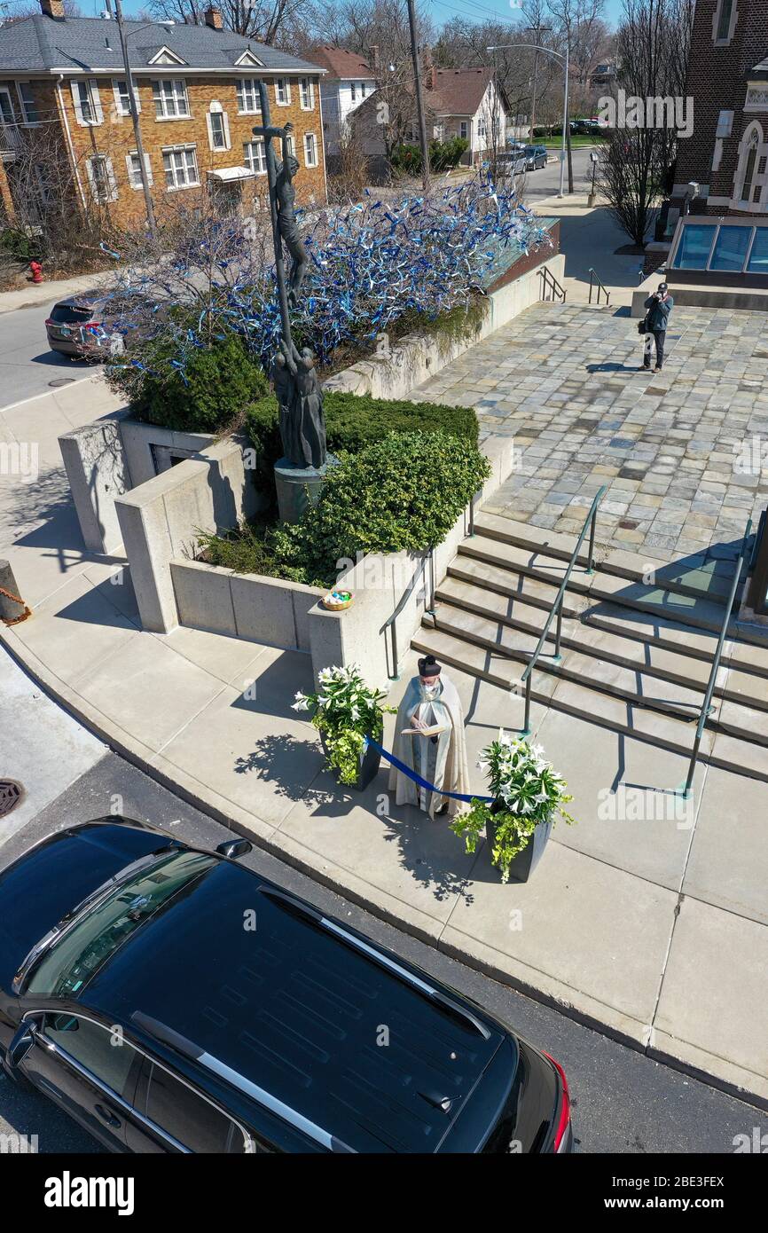 Grosse Pointe Park, Michigan, USA. 11th Apr, 2020. Wearing a mask, face ...