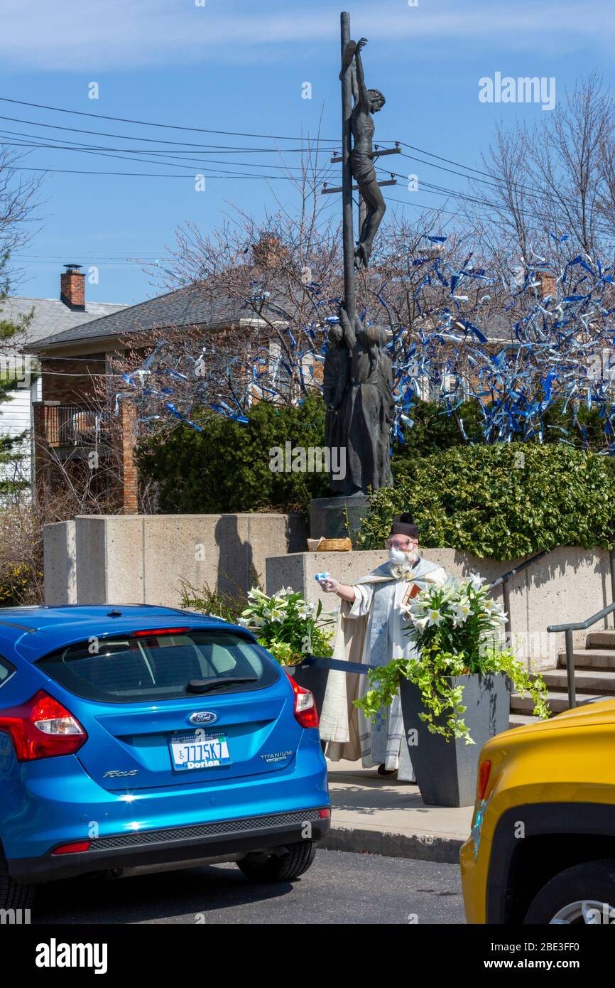 Grosse Pointe Park, Michigan, USA. 11th Apr, 2020. Wearing a mask, face ...