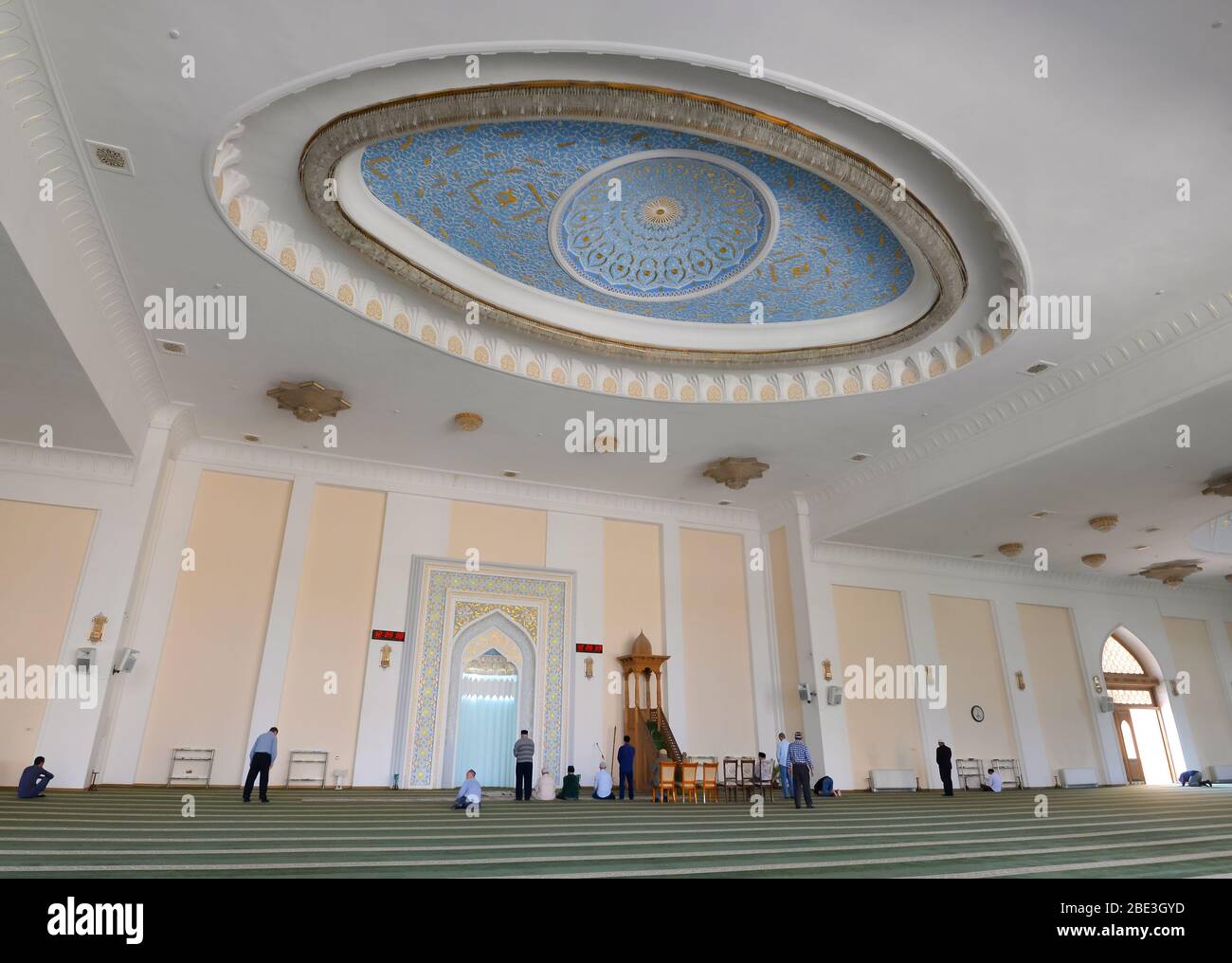 Interior view of Tilla Sheikh Mosque with simple ornaments and mihrab ...