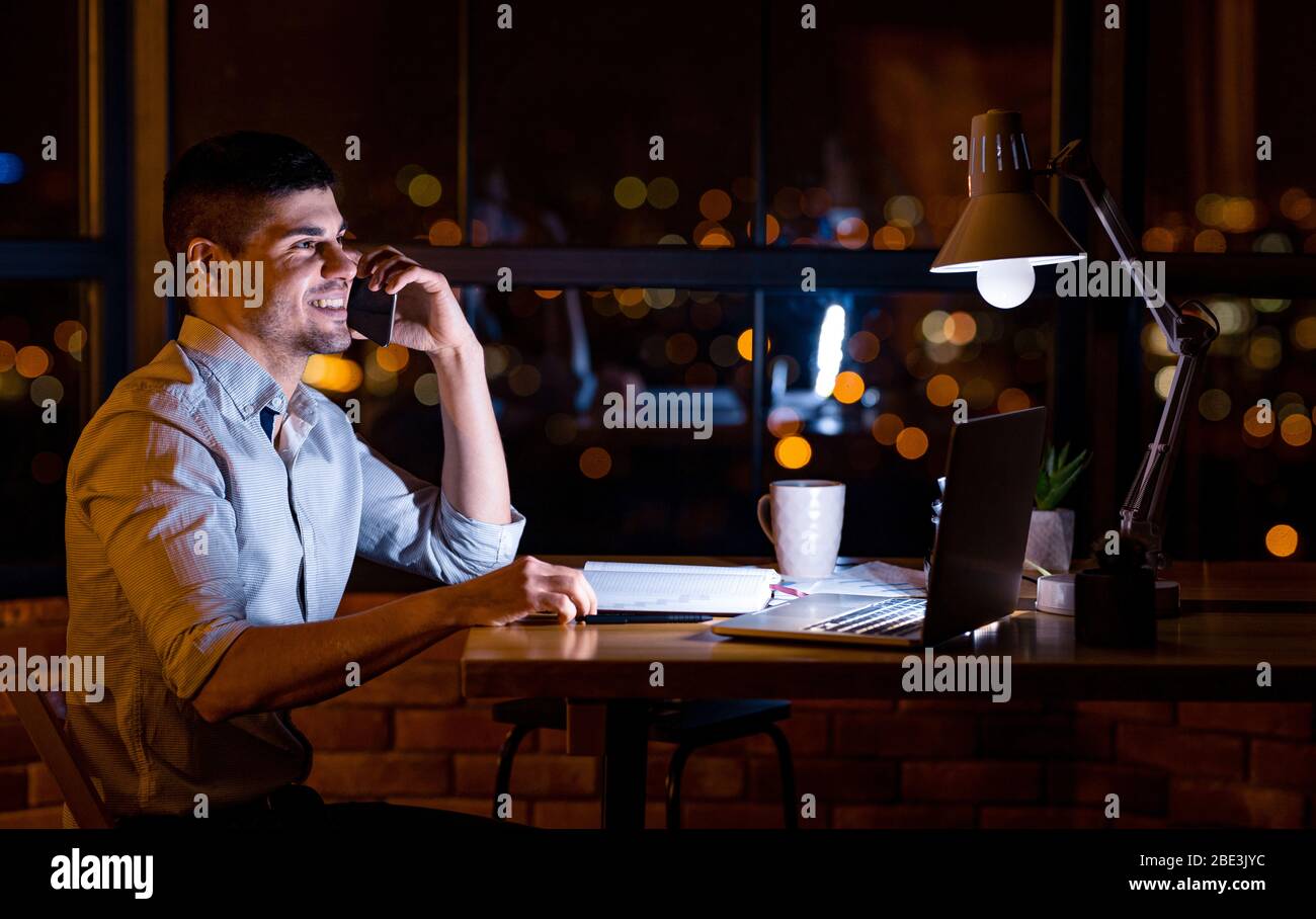 Businessman Talking On Cellphone Communicating With Distant Colleague ...