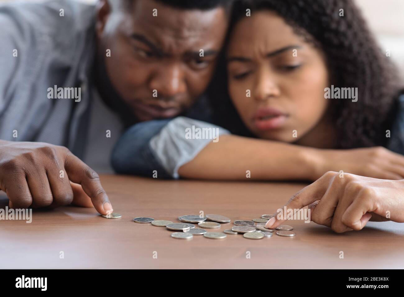 Family Financial Problems. Black Couple Counting Remaining Coins ...