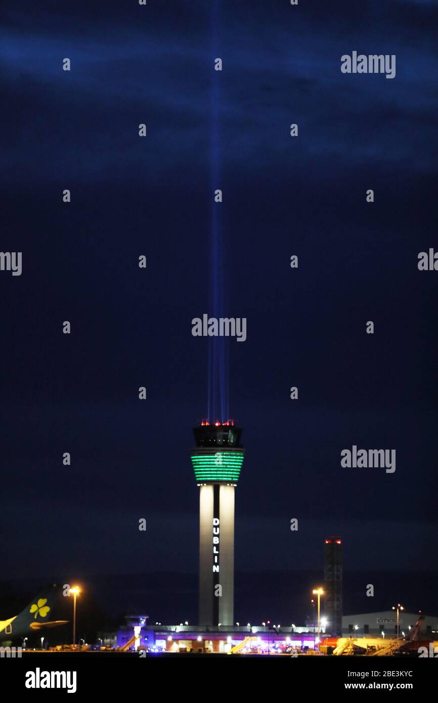A large beam of light shines out of the new air traffic control tower ...