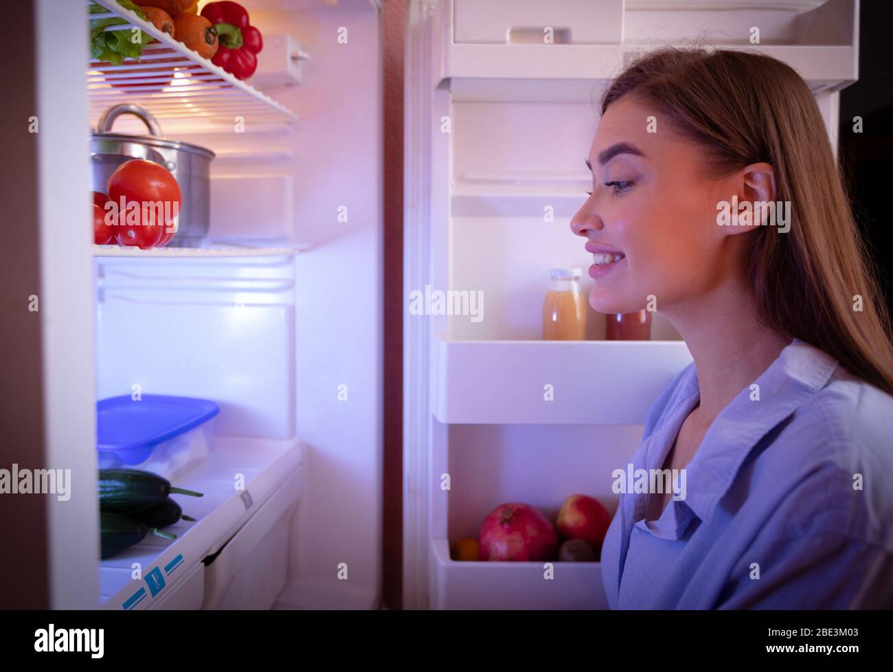 Woman snack late night hi-res stock photography and images - Alamy