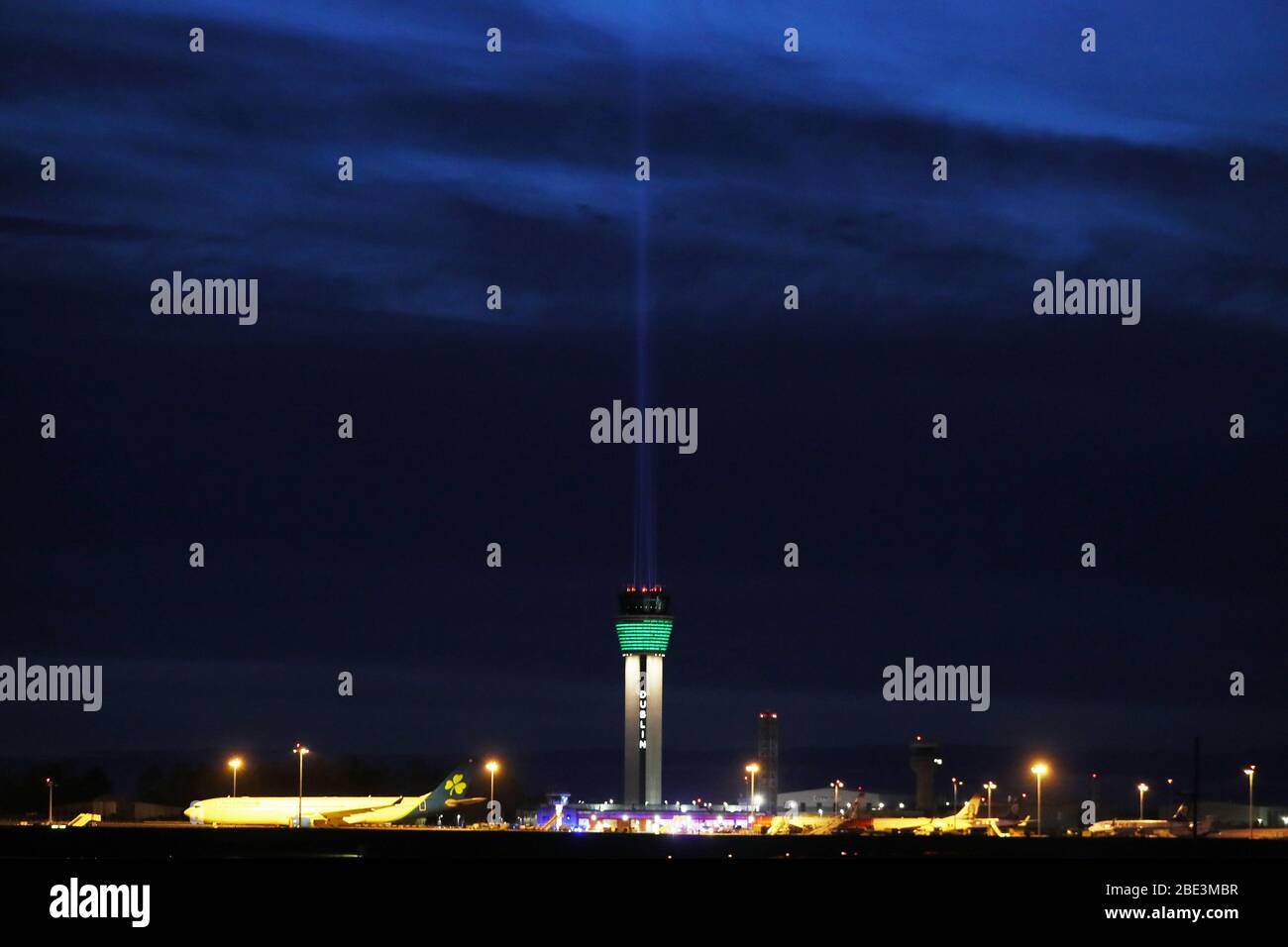 A large beam of light shines out of the new air traffic control tower ...