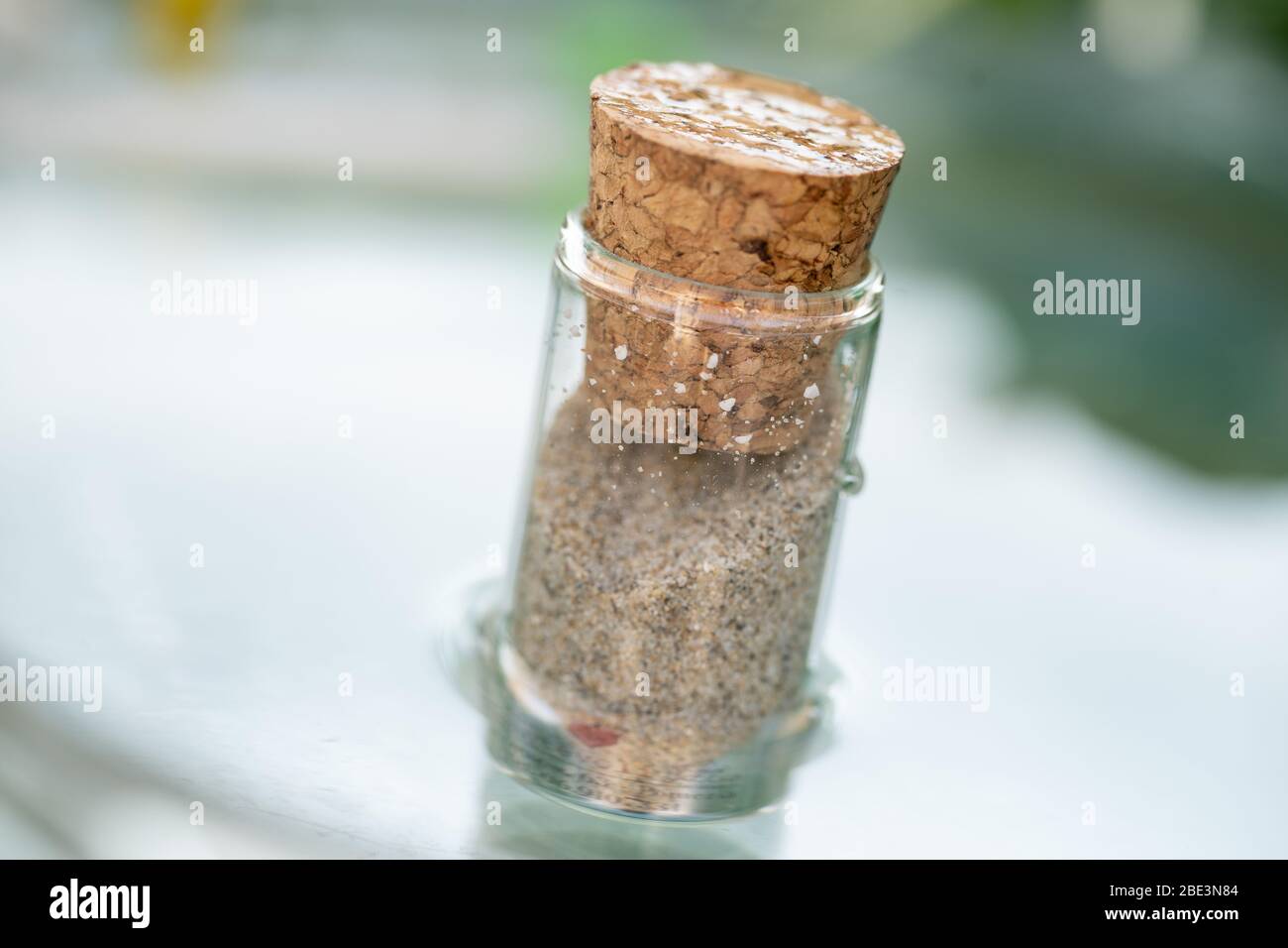 glass bottle full of sand Stock Photo - Alamy
