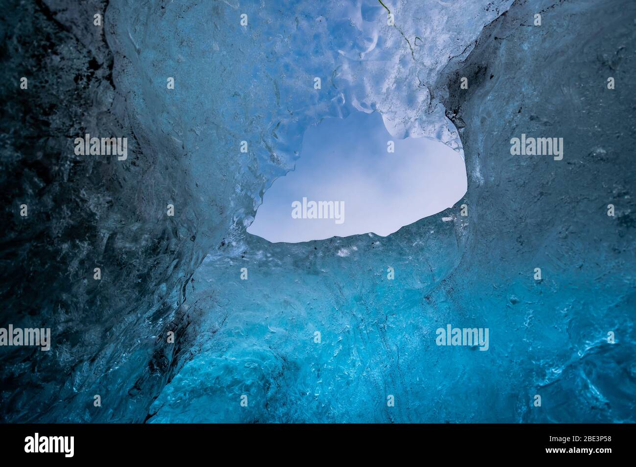Inside a glacier ice cave in Iceland Stock Photo - Alamy