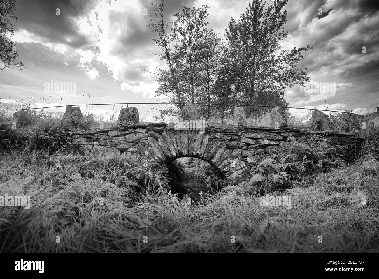 Ancient bridge crossing old Black and White Stock Photos & Images - Alamy