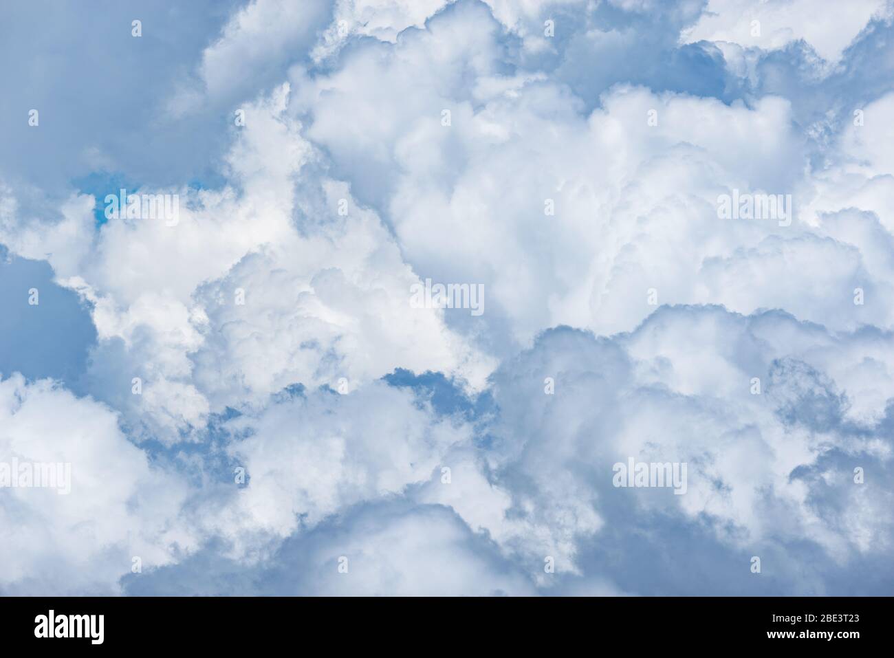 Clouds rise from the mountain gorge at day time Stock Photo - Alamy