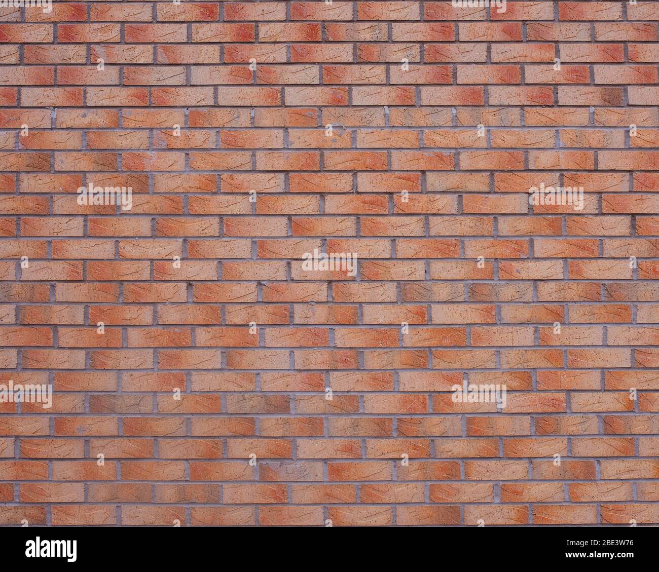 Red burned brick wall background Stock Photo - Alamy