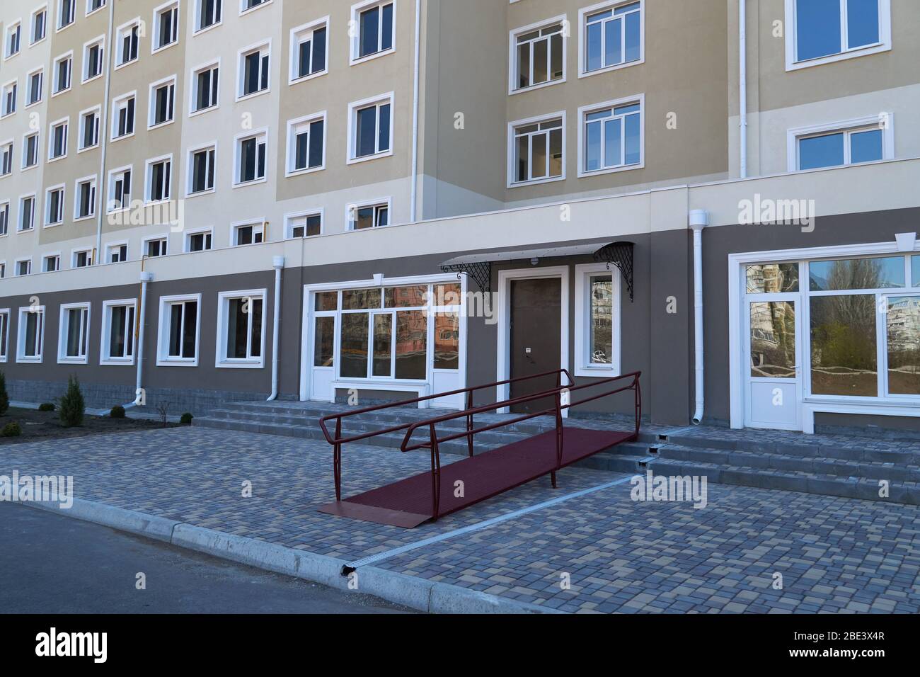 Wheelchair access ramp for entrance of residential multistory building ...