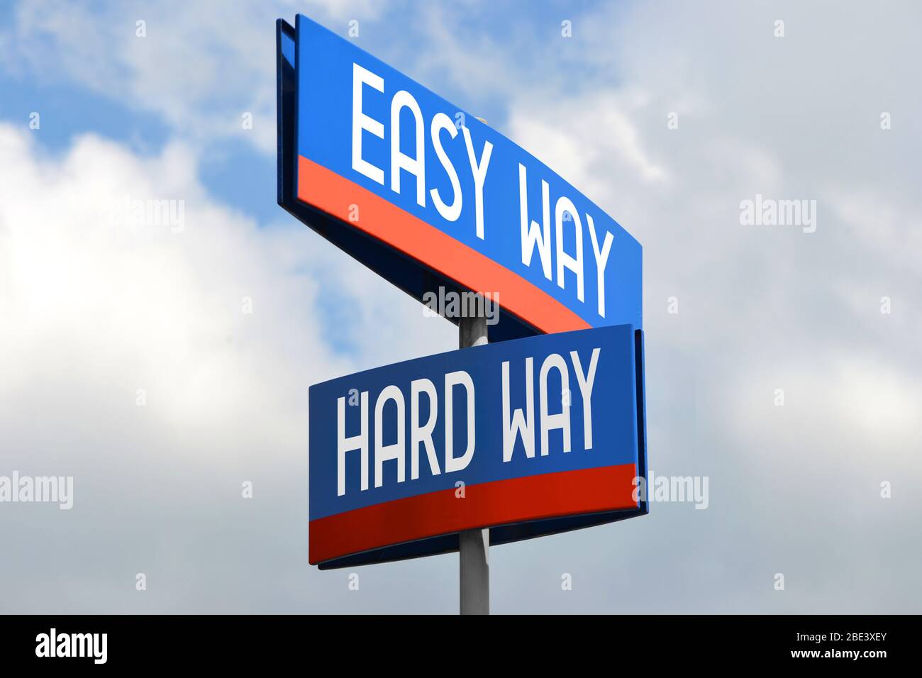 Easy and hard way street sign Stock Photo - Alamy