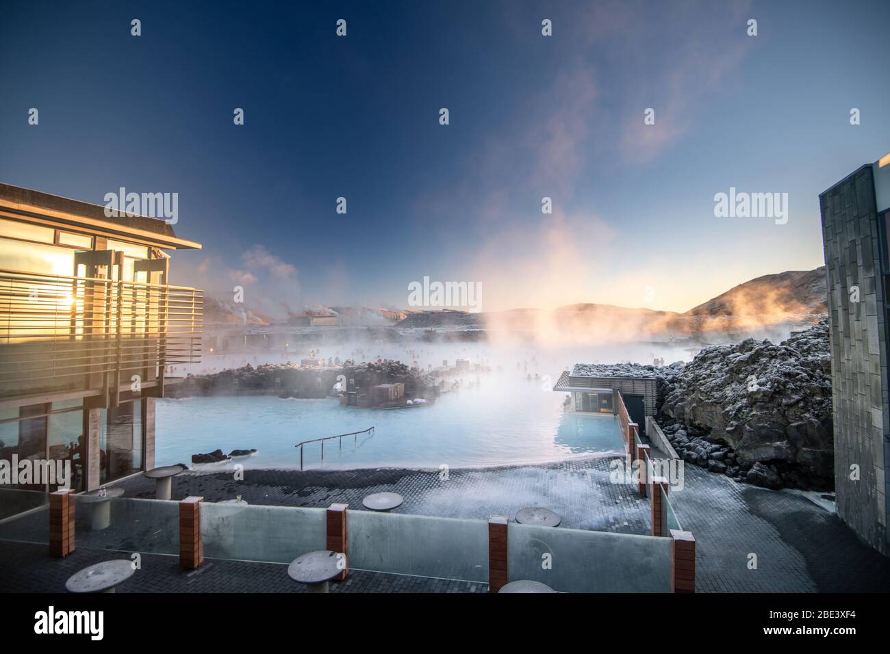 Blue lagoon hot spring geothermal spa at sunset in winter in Iceland ...