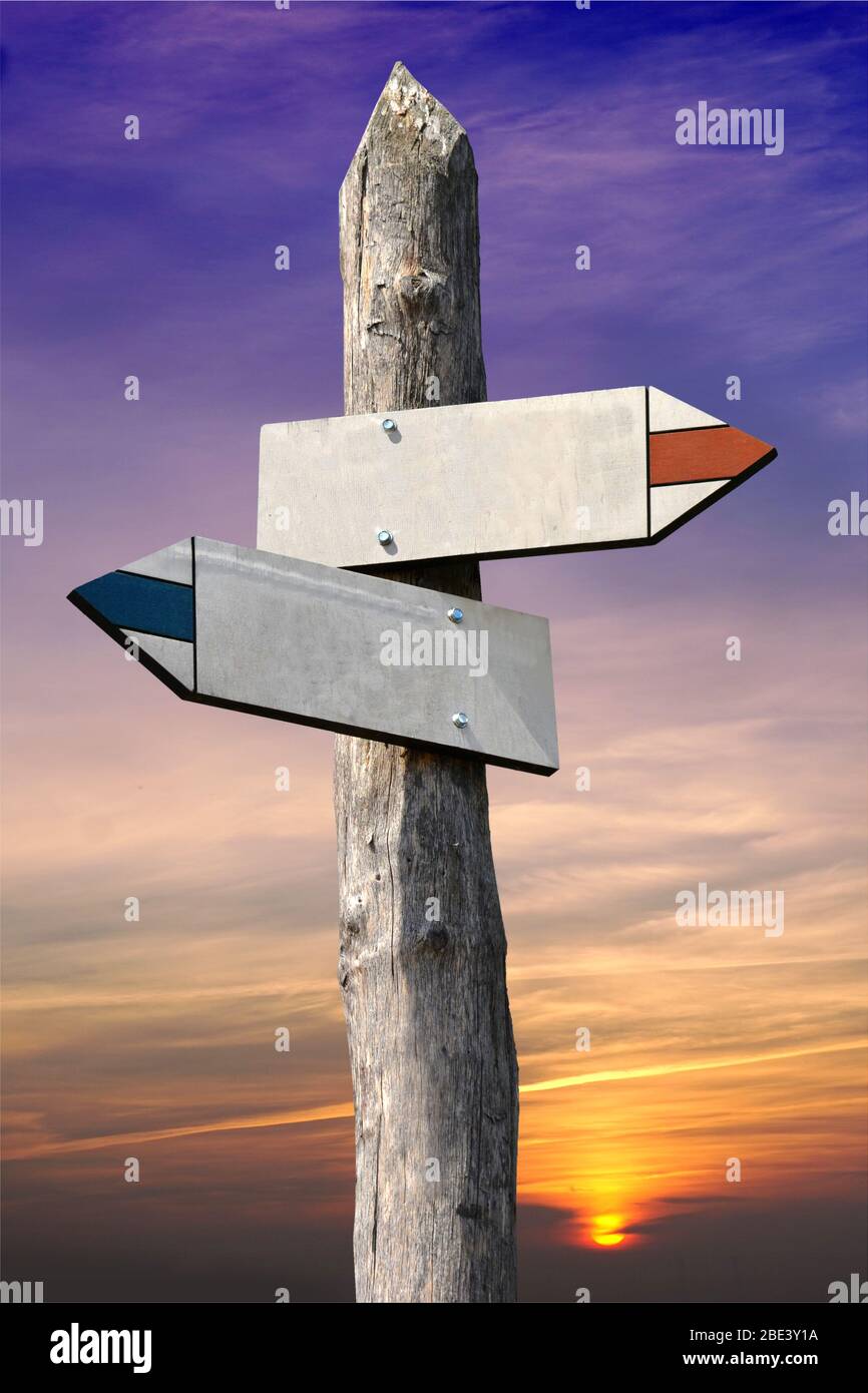 Empty wooden signpost Stock Photo - Alamy