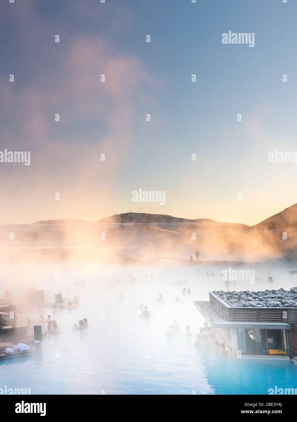 Blue lagoon hot spring geothermal spa at sunset in winter in Iceland ...