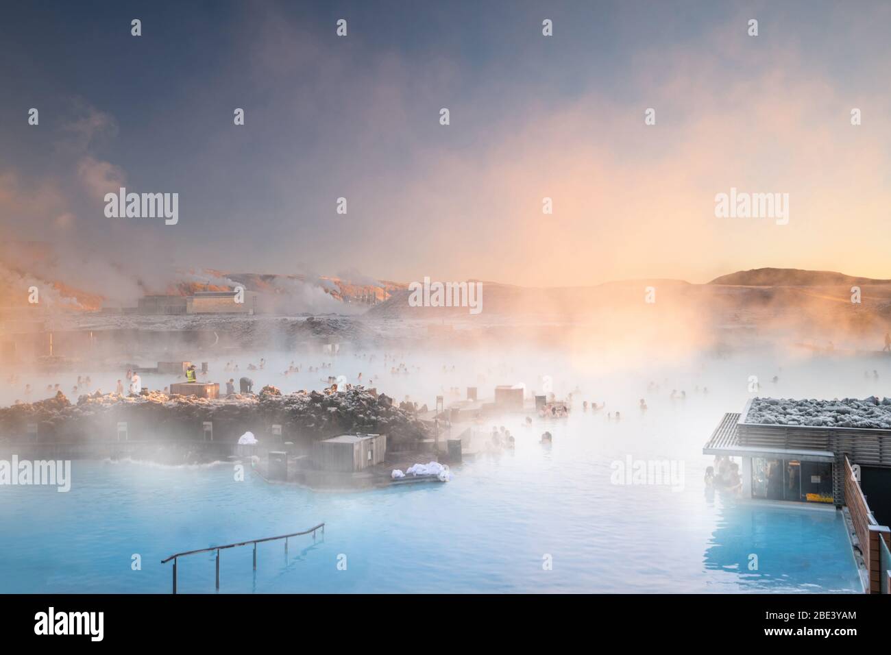 Blue lagoon hot spring geothermal spa at sunset in winter in Iceland ...