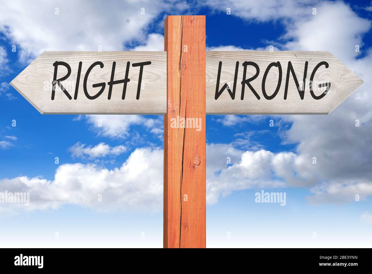 Right or wrong - wooden signpost Stock Photo - Alamy