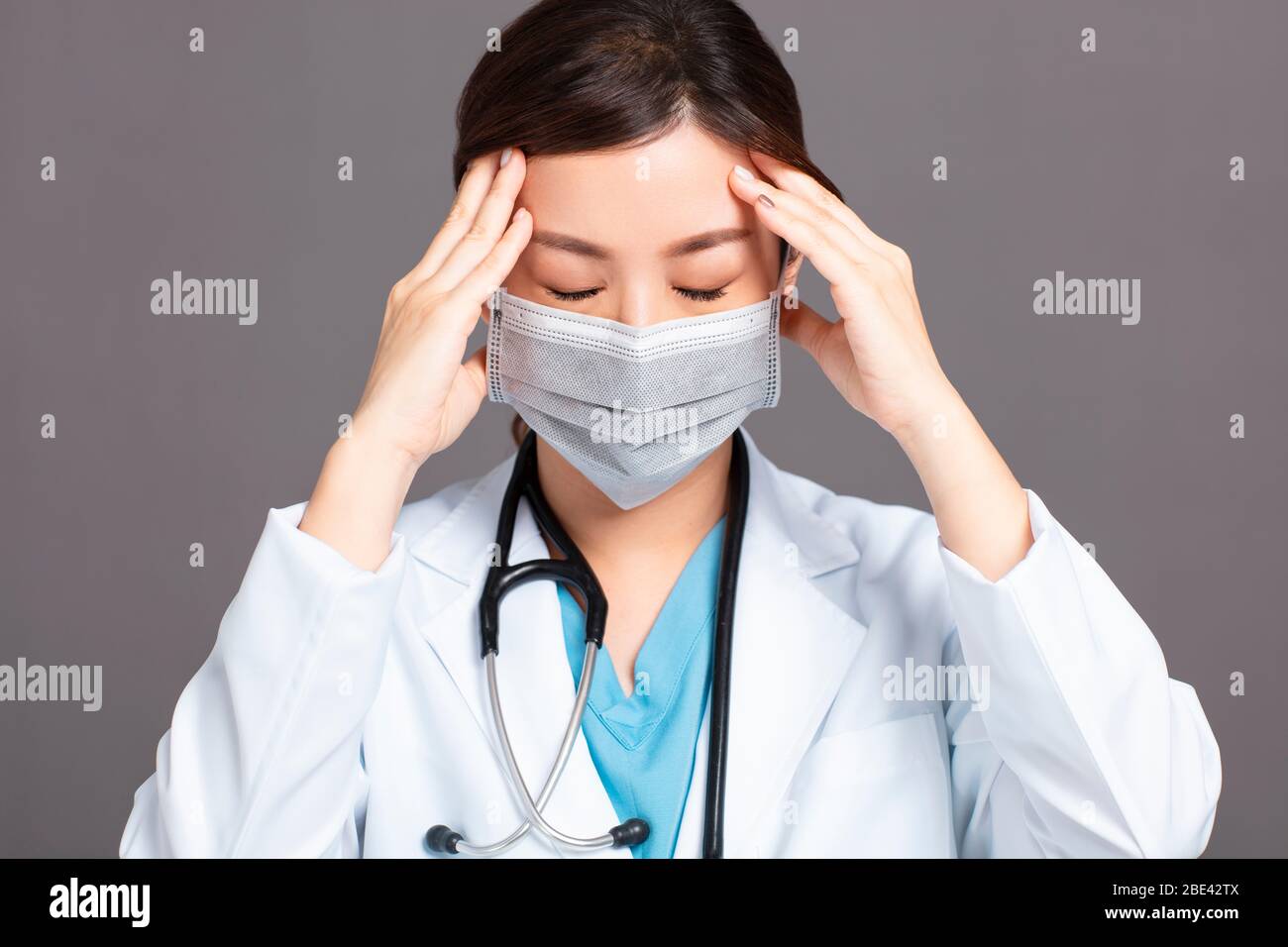 female doctor under tired, stress and headache Stock Photo - Alamy