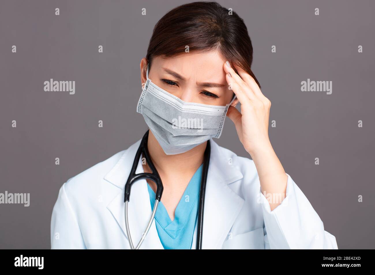 female doctor under tired, stress and headache Stock Photo - Alamy