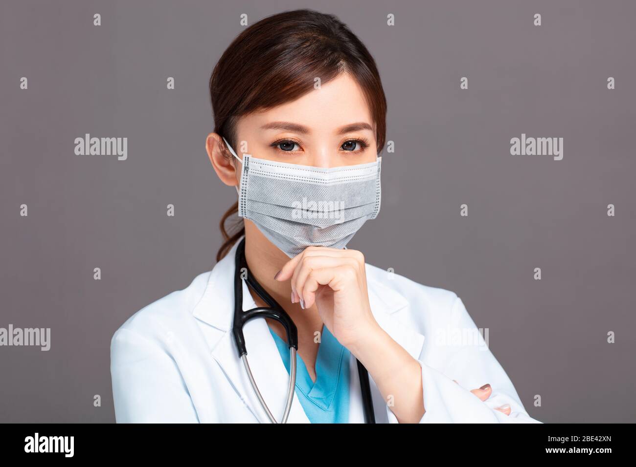 Professional female doctor wearing hi-res stock photography and images ...