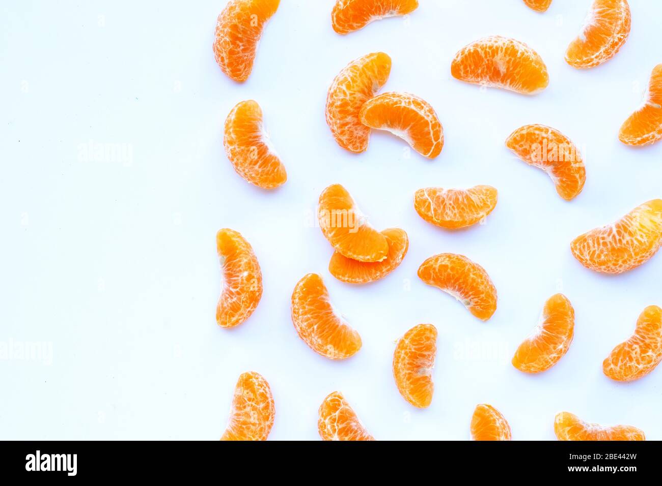 Mandarin segments, Fresh orange isolated on white background. Copy ...