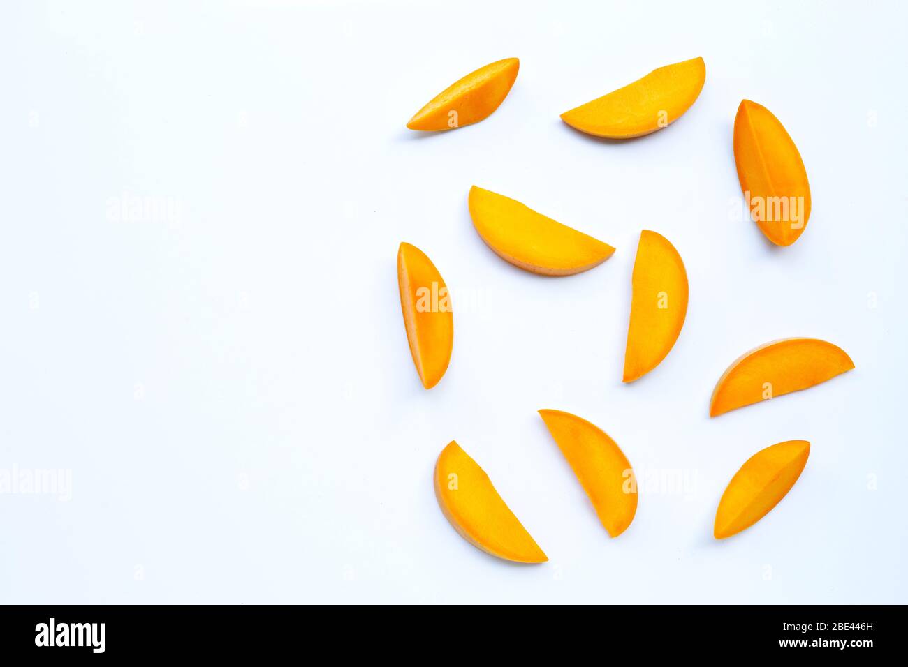 Tropical fruit, Mango slices on white background. Copy space Stock ...