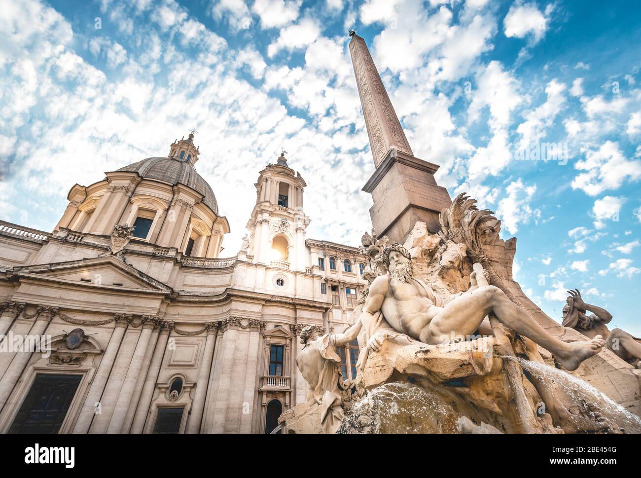 Baroque Marble Fountain in Piazza Navona under Summer Sun and Blue Sky ...