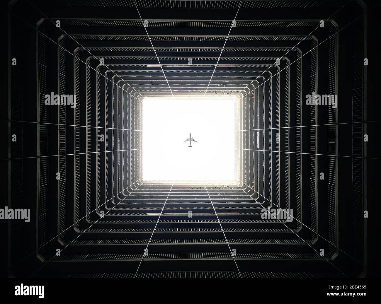 Passenger Plane Fly Overhead Through Dark Building Atrium within Dark ...