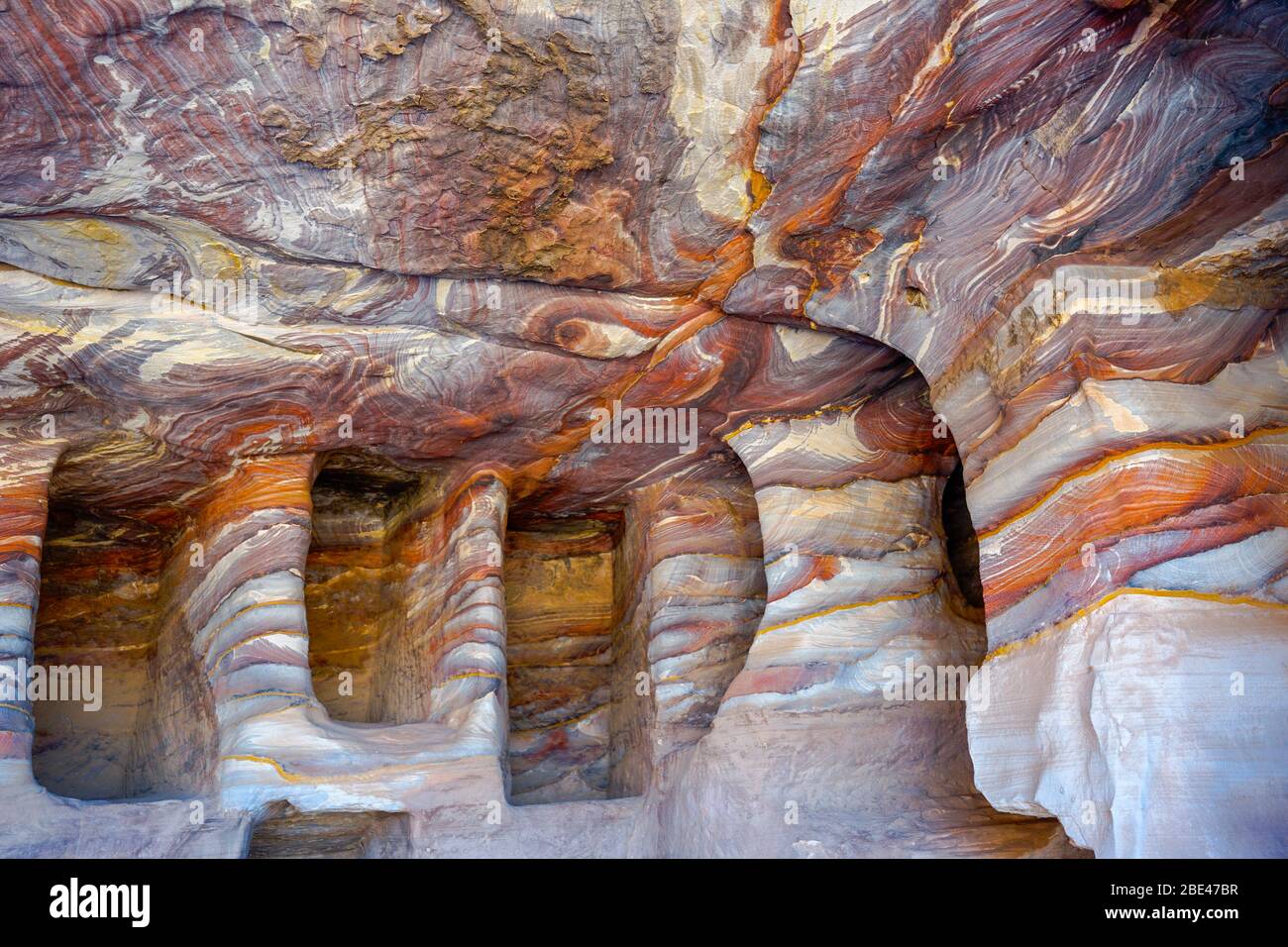 Jordan, in Petra amazing multicoloured sandstone inside the caves Stock ...