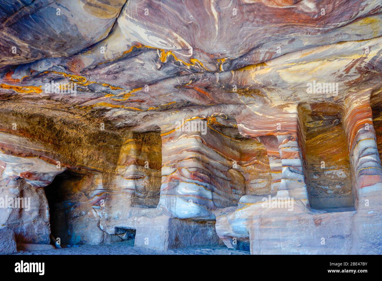 Jordan, in Petra amazing multicoloured sandstone inside the caves Stock ...