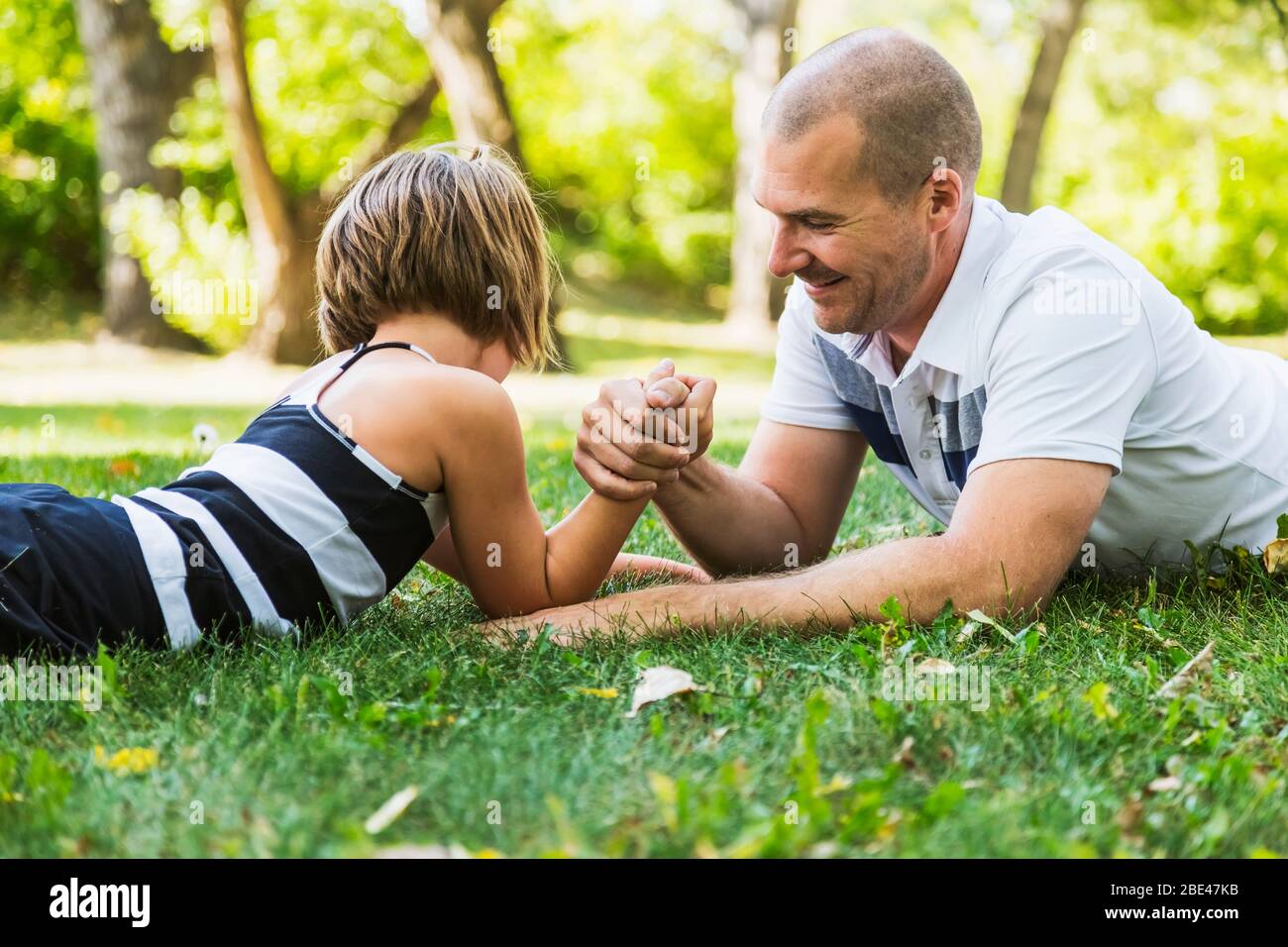 Arm wrestling children hi-res stock photography and images - Alamy